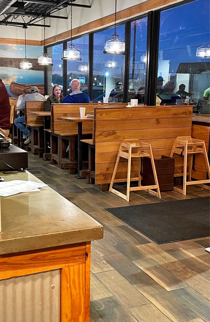 These aren't just dining booths—they're confession booths where people admit their undying love for properly smoked meat.