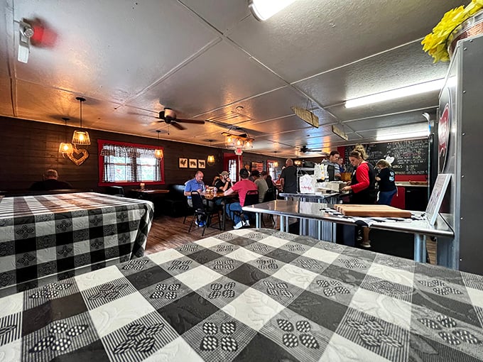 Where barbecue brings people together. The black and white checkered floor provides the perfect stage for the colorful flavor explosions happening at every table.