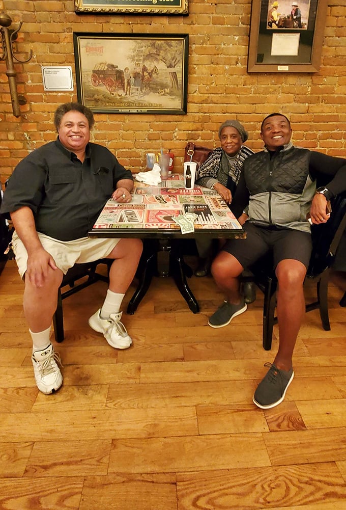 Happy diners sharing stories and smiles—the true measurement of any restaurant's success isn't just the food, but the joy it creates.