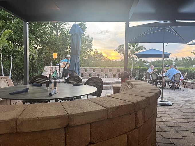 Sunset dining that makes you forget deadlines exist. Those stone walls aren't just holding up tables—they're keeping reality at bay for another hour.