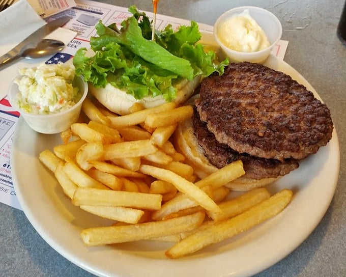 A burger that means business – two substantial patties with all the fixings that require both hands and several napkins.