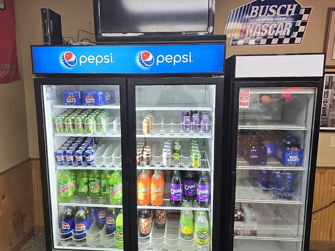 The drink cooler—unsung hero of spicy food emergencies. Those colorful cans stand ready to extinguish any pepper-induced fires.