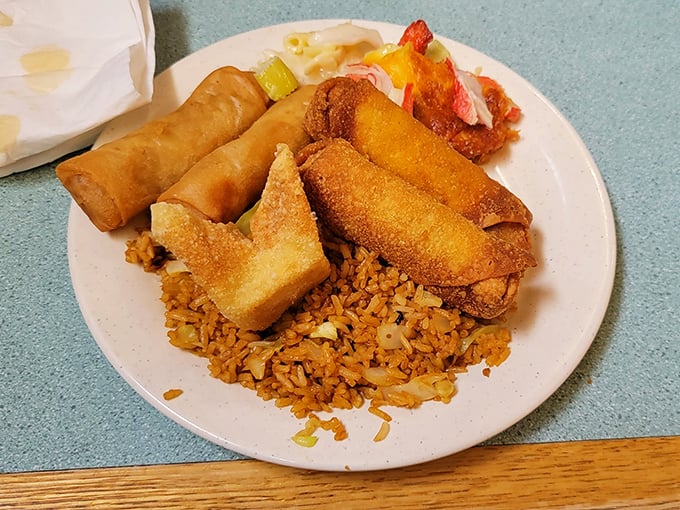 Crispy egg rolls and spring rolls – the unsung heroes of any Chinese buffet, ready to be dunked in sweet sauce.