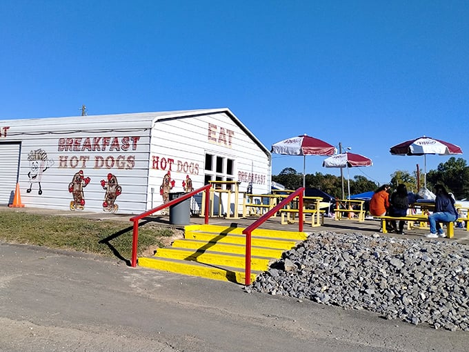 The hot dog stand's bright yellow steps practically dare you not to stop—because flea market exploration requires proper fueling at regular intervals.