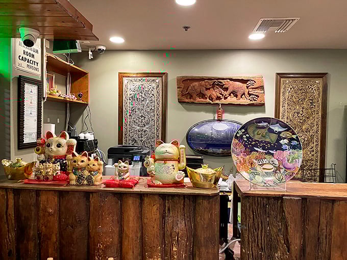 Lucky cats and traditional decorations welcome you at the front desk—silent promises of the good fortune about to befall your taste buds.