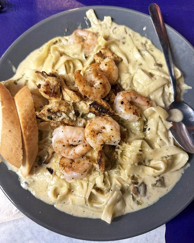 This isn't your nonna's fettuccine—it's New Mexico's spicy take on Italian comfort food with perfectly grilled shrimp as the crowning glory.