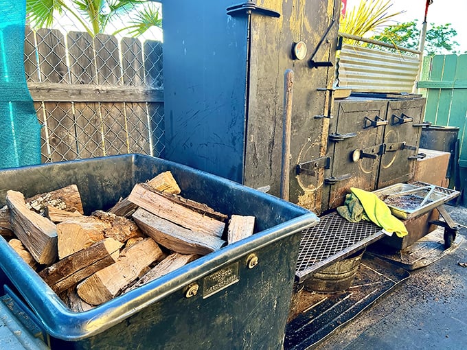 The smoking setup—where wood, metal, time, and expertise combine in the alchemy that turns ordinary meat into extraordinary barbecue.
