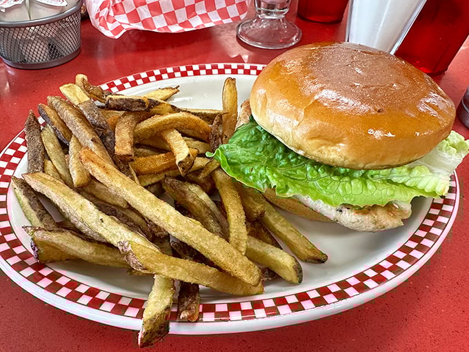 A burger and fries that doesn't need fancy aioli or truffle oil to impress – just honest ingredients prepared with respect and skill.