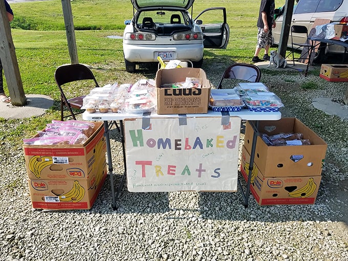 Hand-lettered signs announce homemade goodies, proving that entrepreneurial spirit starts at any age with a folding table.
