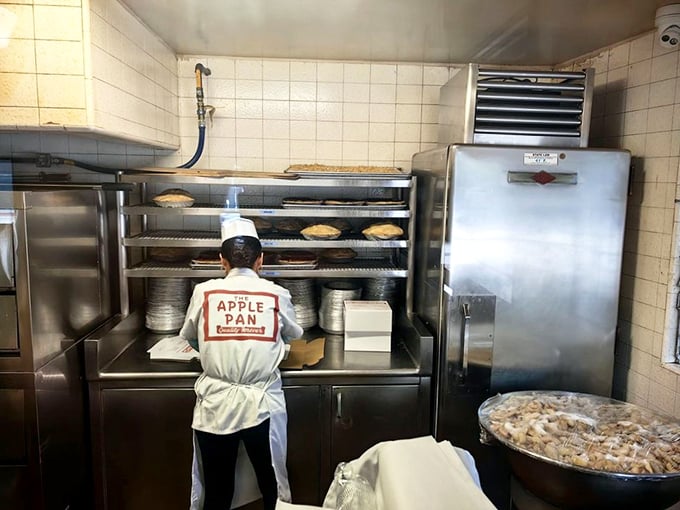 The kitchen reveals the secret ingredient missing from trendy restaurants – tradition maintained through generations of dedicated staff who understand the value of consistency.