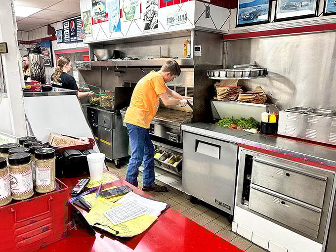 The open kitchen concept isn't trendy here—it's tradition. Nothing to hide when you're doing it right.