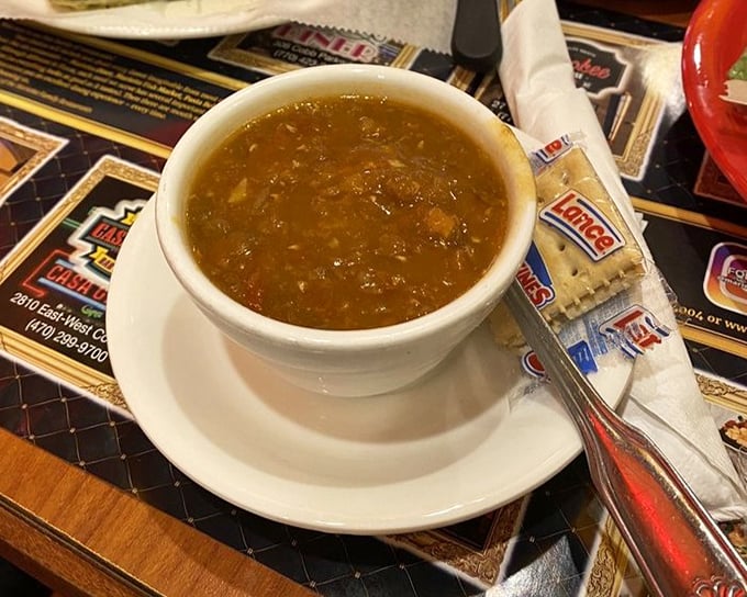 The lentil soup arrives steaming with promise, a humble bowl that delivers complex flavors without any unnecessary showing off.
