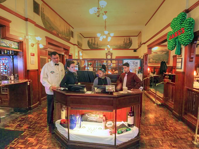 The host stand at Jake's – first checkpoint on your journey to seafood nirvana, where the staff prepares to guide you through a maritime feast.