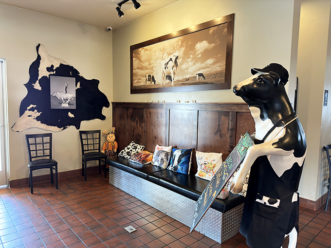 A waiting area that embraces its bovine theme with such commitment, you half expect the cow statue to take your order.