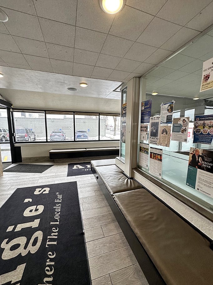 Even the waiting area says "welcome home"—the entrance mat isn't just stating where locals eat, it's inviting you to become one of them.
