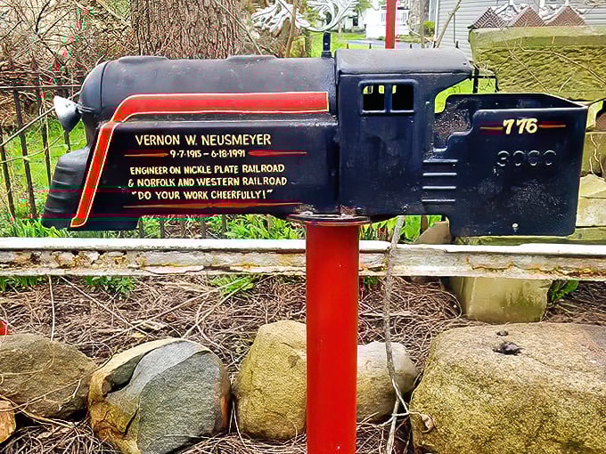 Even the mailbox gets the artistic treatment here – a locomotive tribute to a railroad engineer with the sage advice to "do your work cheerfully!"