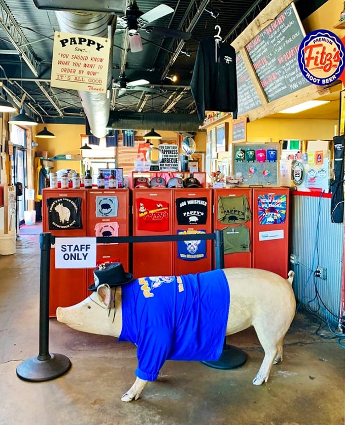 The pig statue dressed in blue stands guard over merchandise—a whimsical reminder of who we should thank for our meal.