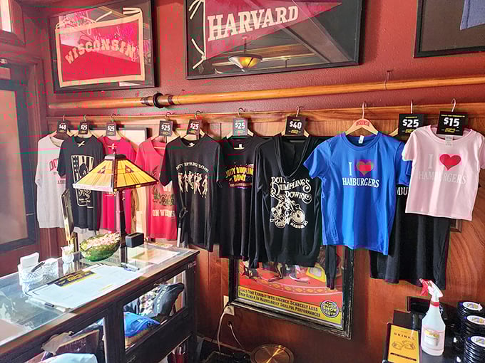 College pennants and memorabilia remind you that in Madison, education extends beyond campus to the important study of burger craft.