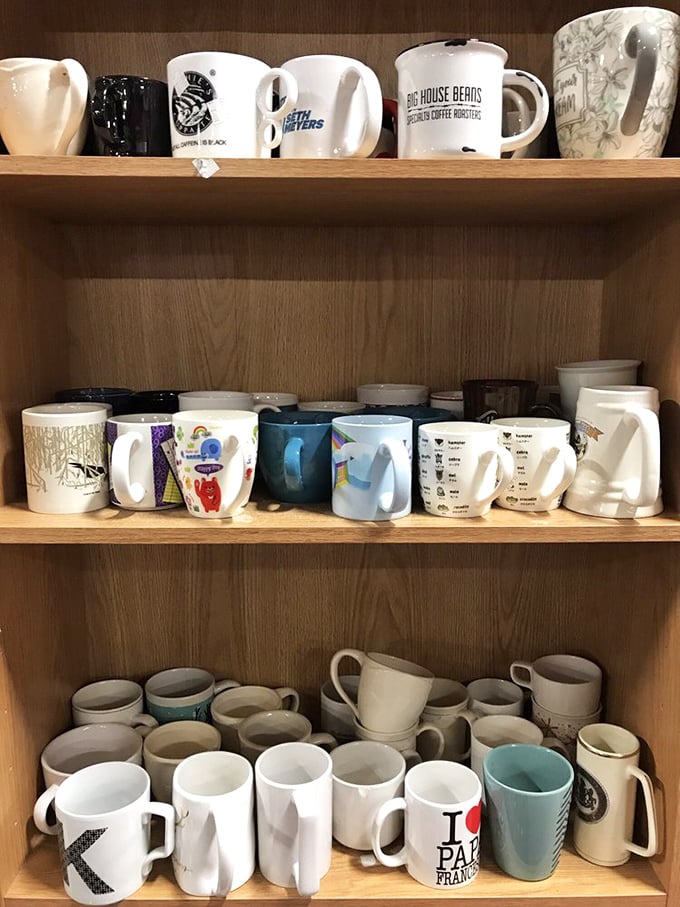A mug collection that tells the story of America one coffee break at a time—spot the "I ♥ Paris" holdout!
