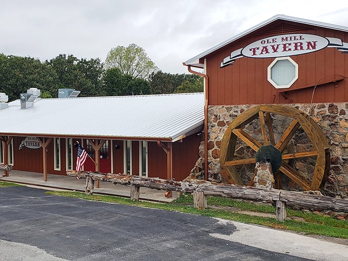 Ole Mill Tavern's water wheel stands as a rustic reminder of simpler times, while inside, the simple pleasure of cold beer awaits.