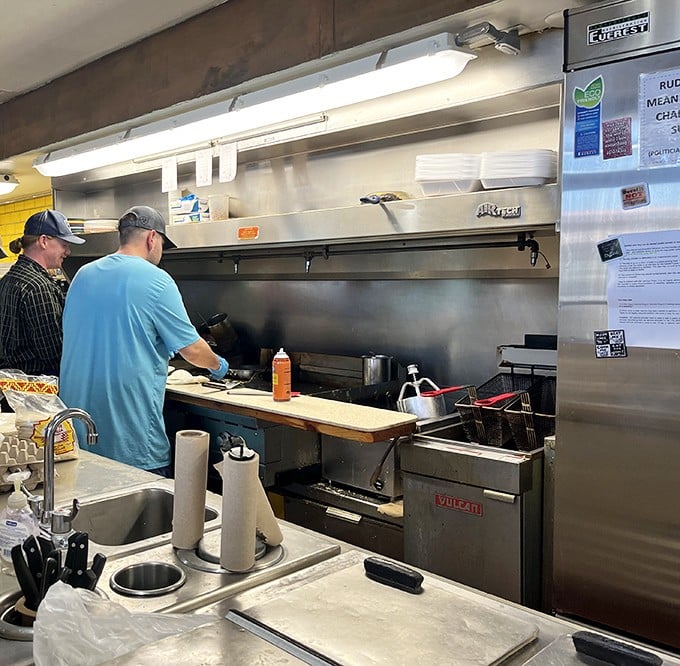 The open kitchen means accountability and entertainment – watch your breakfast come together on that impressive griddle setup.