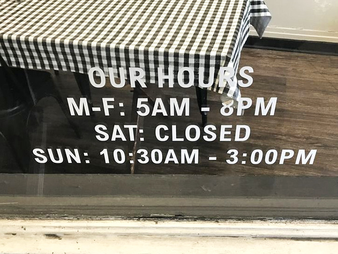 Hours posted with Southern directness—closed Saturdays because even comfort food deserves a day off.
