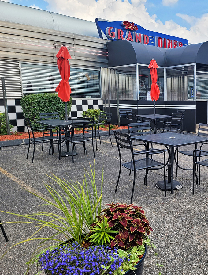 The outdoor seating area isn't trying to be a Parisian café—it's proudly Michigan, where fresh air makes everything taste better, even perfection.