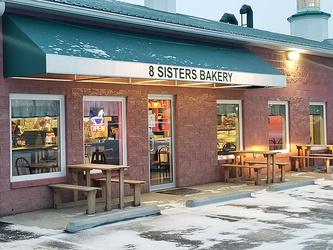 Even in winter, wooden picnic tables stand ready for those who can't wait to get home before diving into their bakery treasures.