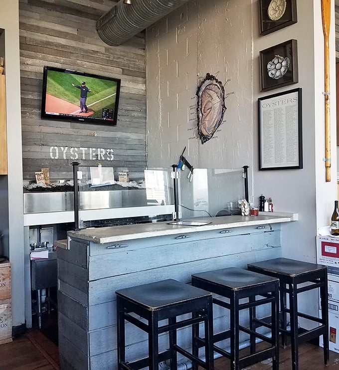 The oyster bar—a front-row seat to the shucking show where bivalves meet their delicious destiny before your very eyes.