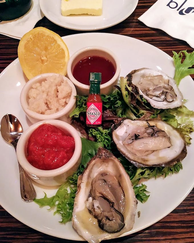 Oysters arranged like jewels on ice – briny treasures from the sea that need nothing more than a squeeze of lemon.