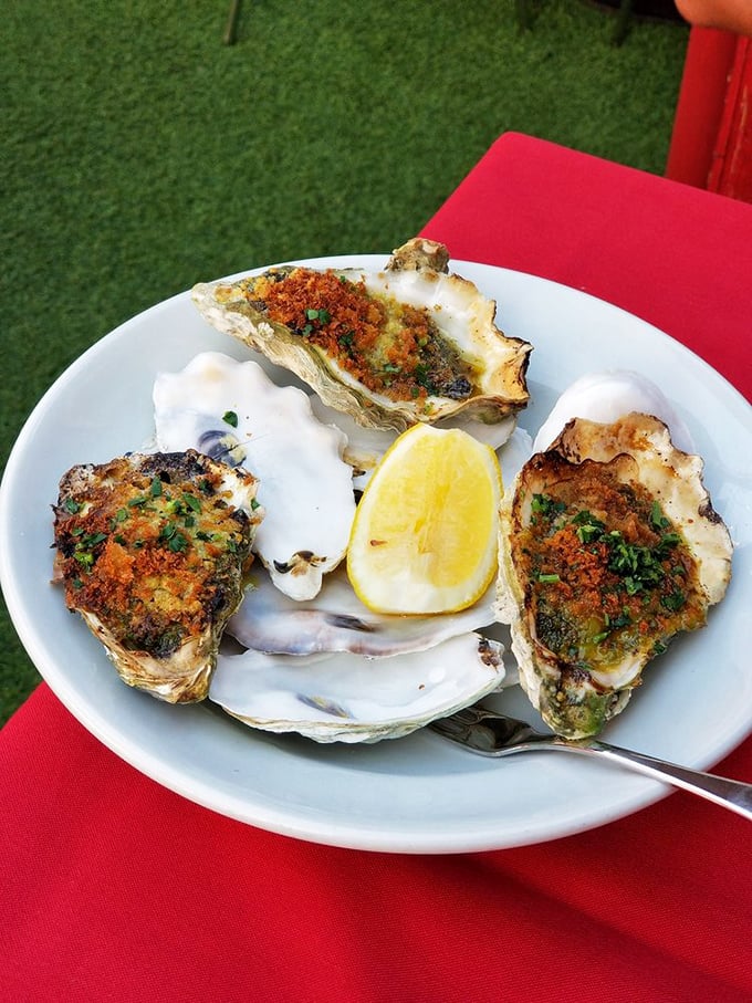 Oysters Rockefeller looking like million-dollar appetizers on a middle-class budget—democracy never tasted so good.