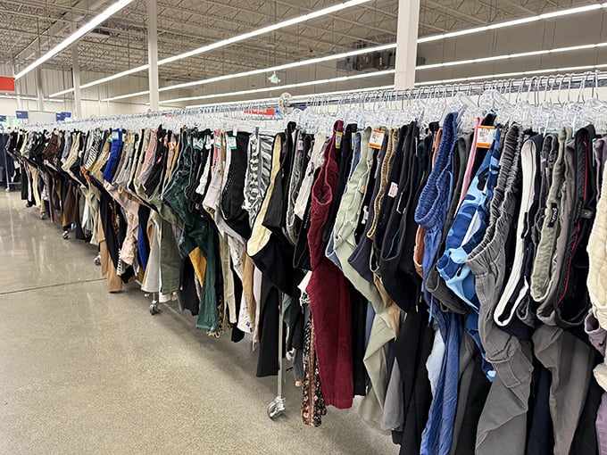 The pants parade hangs with democratic equality—designer denim alongside everyday khakis, all waiting for their second chance at fashion glory.