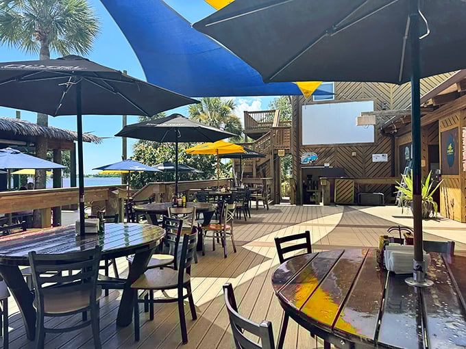 A deck that stretches toward the water like it's trying to become part of the lagoon—dining with a view isn't just an option, it's mandatory.