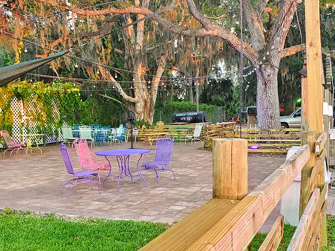 The outdoor patio offers colorful seating under Spanish moss—nature's own mood lighting for enjoying those last bites of key lime pie.