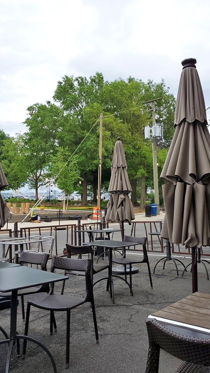 The patio offers fresh air and people-watching with your curry. Those umbrellas aren't just for shade—they're keeping your food's secrets.