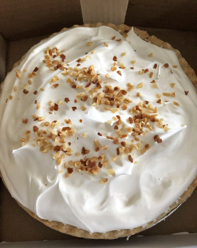 Cloud-like cream topped with toasted coconut—this isn't just pie, it's what angels eat when no one's looking.