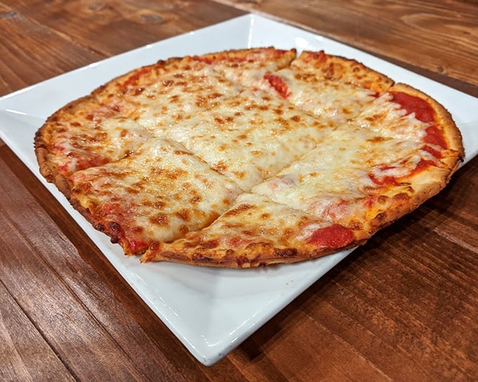 Sometimes simplicity is perfection. This cheese pizza with its golden-brown crust and perfect cheese-to-sauce ratio proves the point deliciously.
