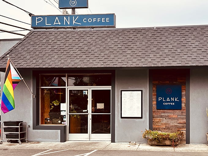 Plank Coffee—where the rainbow flag welcomes all and the espresso machine hums the soundtrack to your morning revelation.