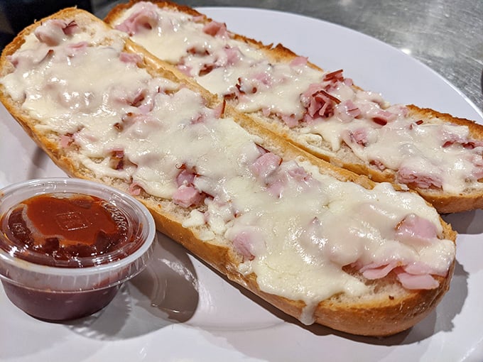 This isn't just melted cheese on bread—it's Polish pizza that proves simplicity, when done right, can outshine complexity every time. Rustic perfection!