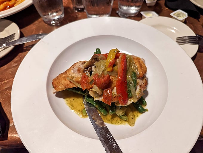 Chicken dressed in peppers, proving that poultry can party when given the right Italian invitation.