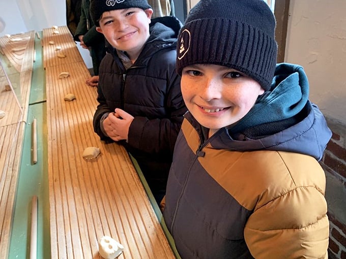 Young pretzel apprentices learning the ancient art of the twist. These future dough masters are getting a hands-on history lesson in American culinary tradition.