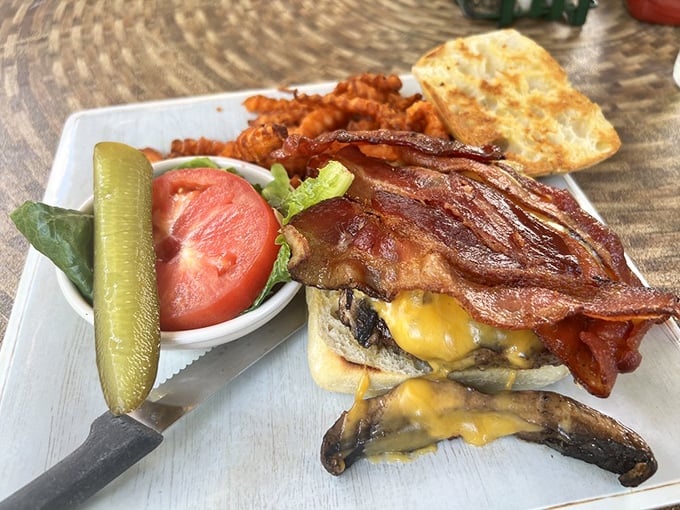 This burger isn't just lunch—it's what happens when breakfast expertise crosses over to the afternoon, with mushrooms and bacon sealing the deal.
