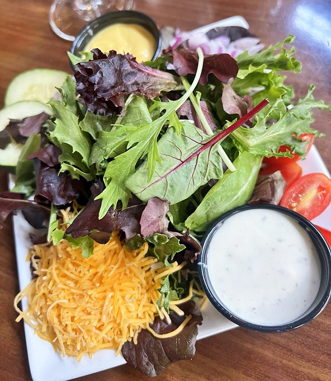 A salad that doesn't apologize for being a salad – fresh greens standing proud with proper Southern hospitality.