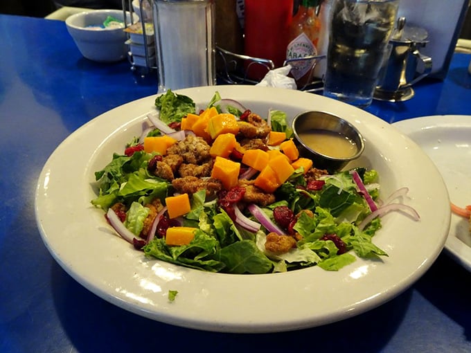 A salad that doesn't apologize for being healthy—it's too busy being delicious. Those candied nuts and cheese cubes are playing chess while other salads play checkers.