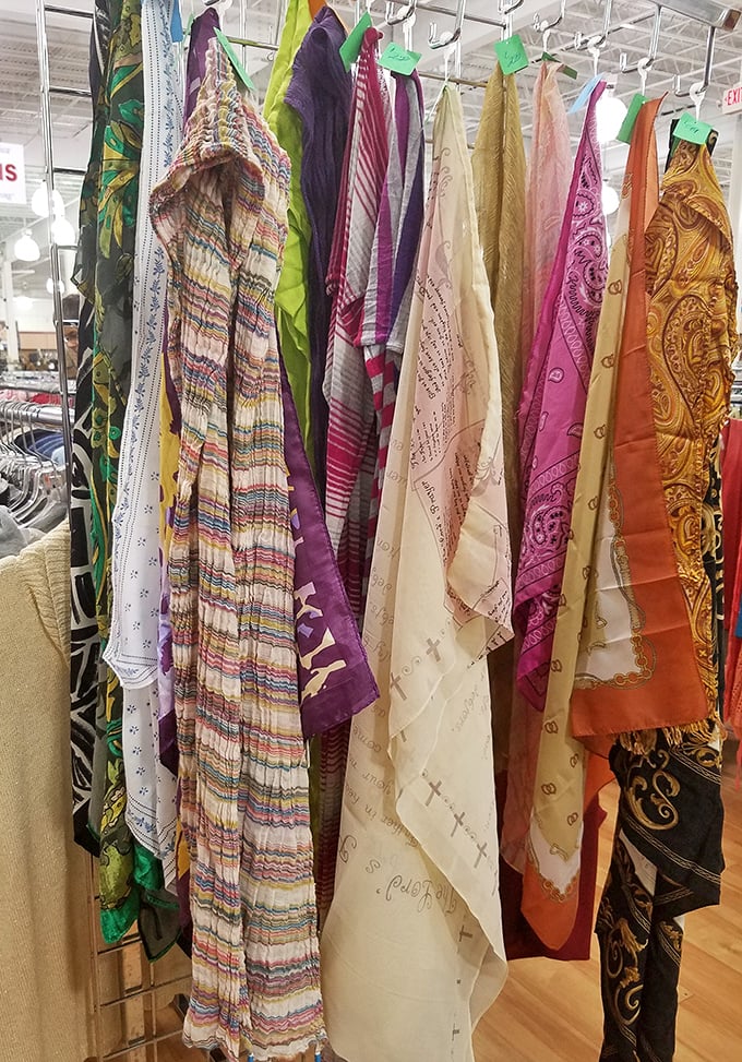Silk scarves dance with color and pattern – instant glamour hanging in wait for necks, handbags, and creative home displays.