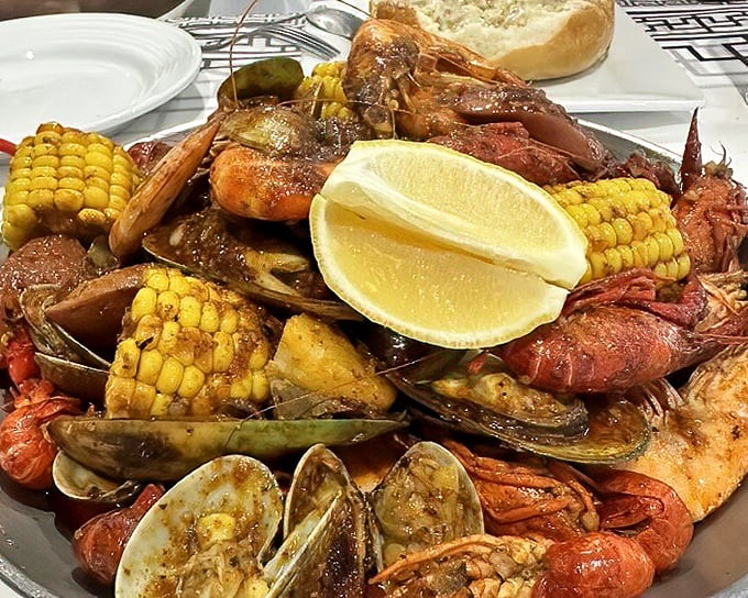 The ultimate communal dining experience—seafood boil with all the fixings. Abandon utensils, all ye who enter here.