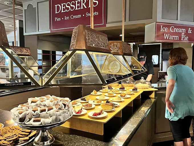 The dessert counter is where willpower goes to die—a parade of pies, cookies, and cakes that make skipping dessert a mathematical impossibility.