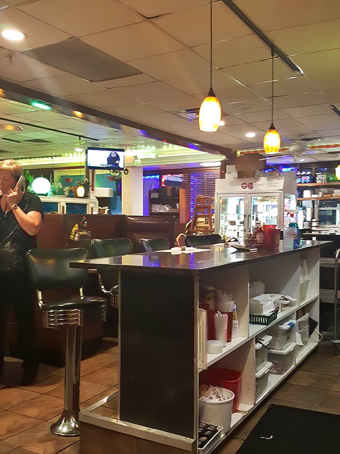 Counter service with a side of nostalgia—where solo diners find community and breakfast tastes better perched on a swivel stool.