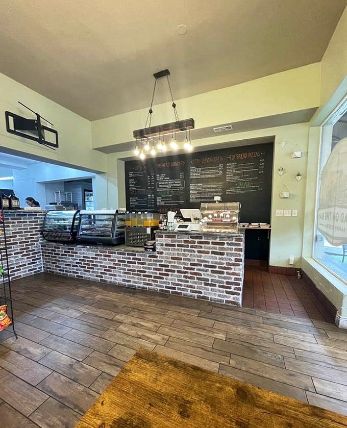 Another angle of sandwich headquarters – where orders are placed and dreams come true under the warm glow of Edison bulbs.