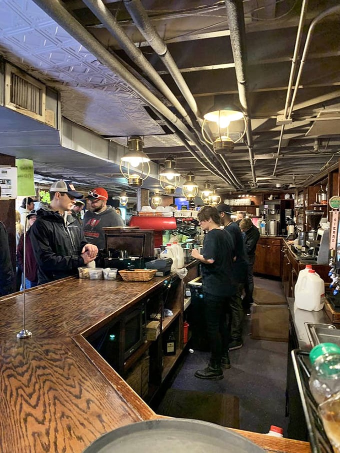 Where barista magic happens. The morning rush choreography here deserves its own Broadway show—"Espresso: The Musical."